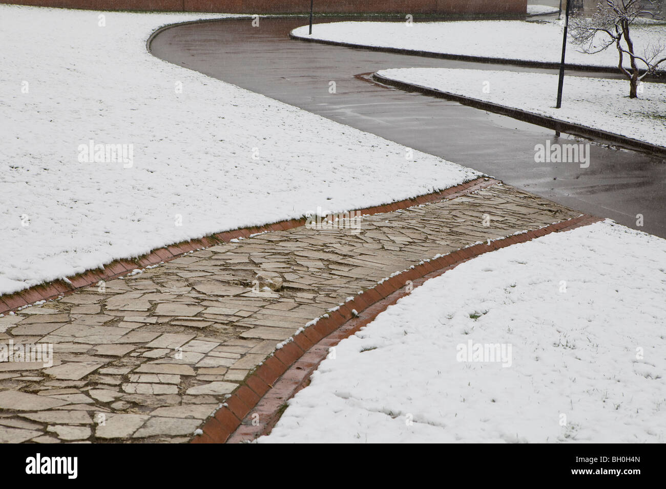 stone path in the snow park Stock Photo - Alamy