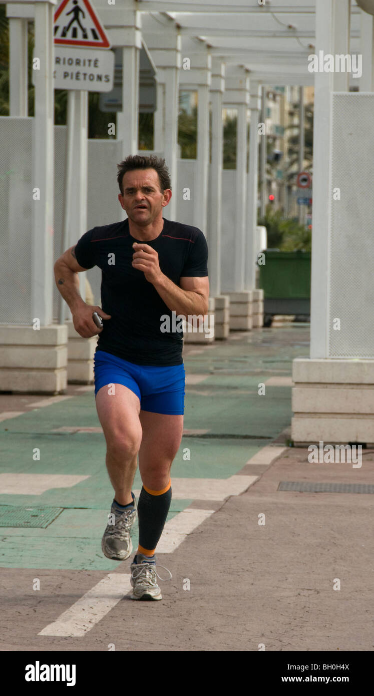 Nice, France, Street Scene, Man Running, Jogging alone, city, promenade ...