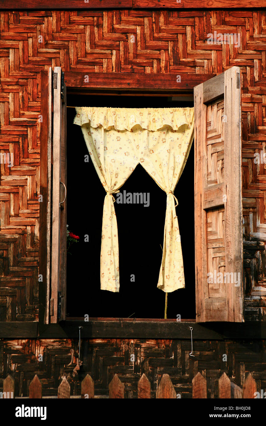 Curtain at the window of a Shan house, Hispaw, Shan State, Myanmar ...