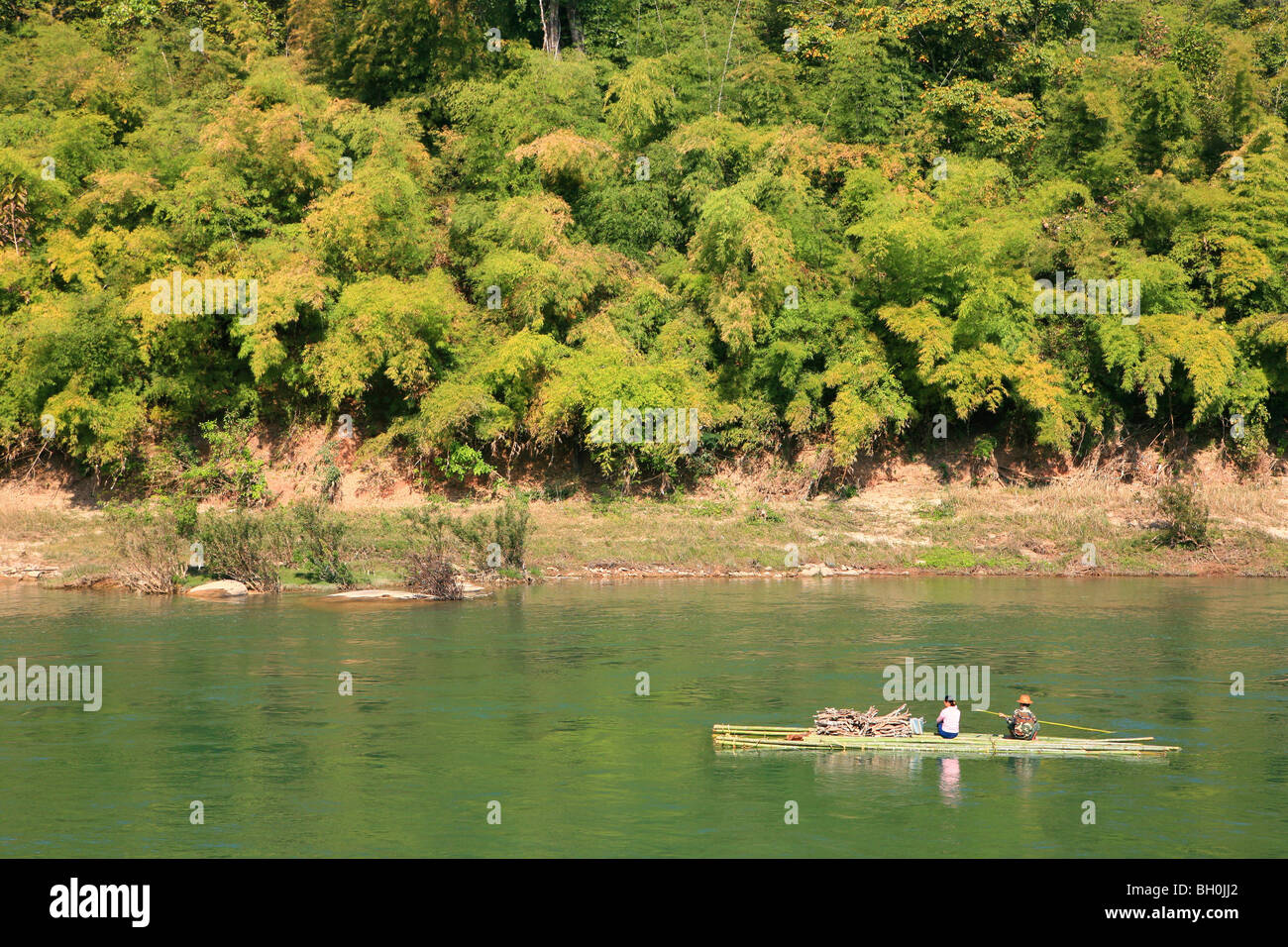 People on bamboo raft on the Namtu river, Hispaw, Shan State, Myanmar ...