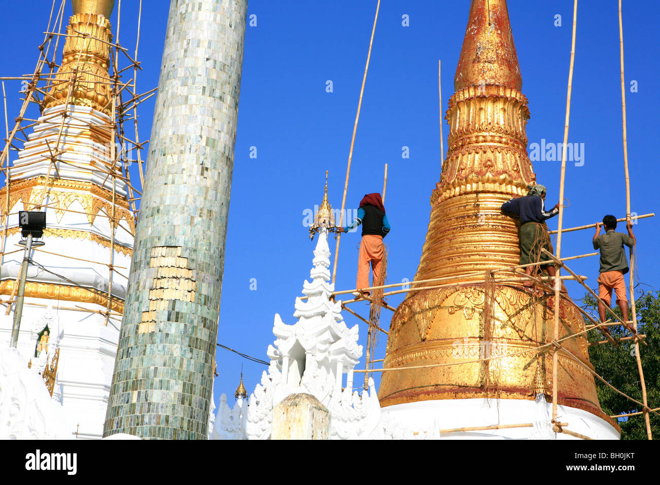 Workers on bamboo scaffold at the Shwedagon Pagoda, Rangoon, Myanmar ...