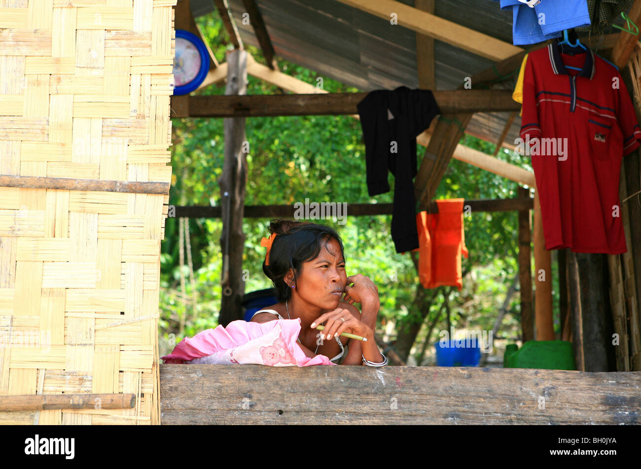 Sea gypsy, Moken woman smoking, Mergui Archipelago, Andaman Sea ...