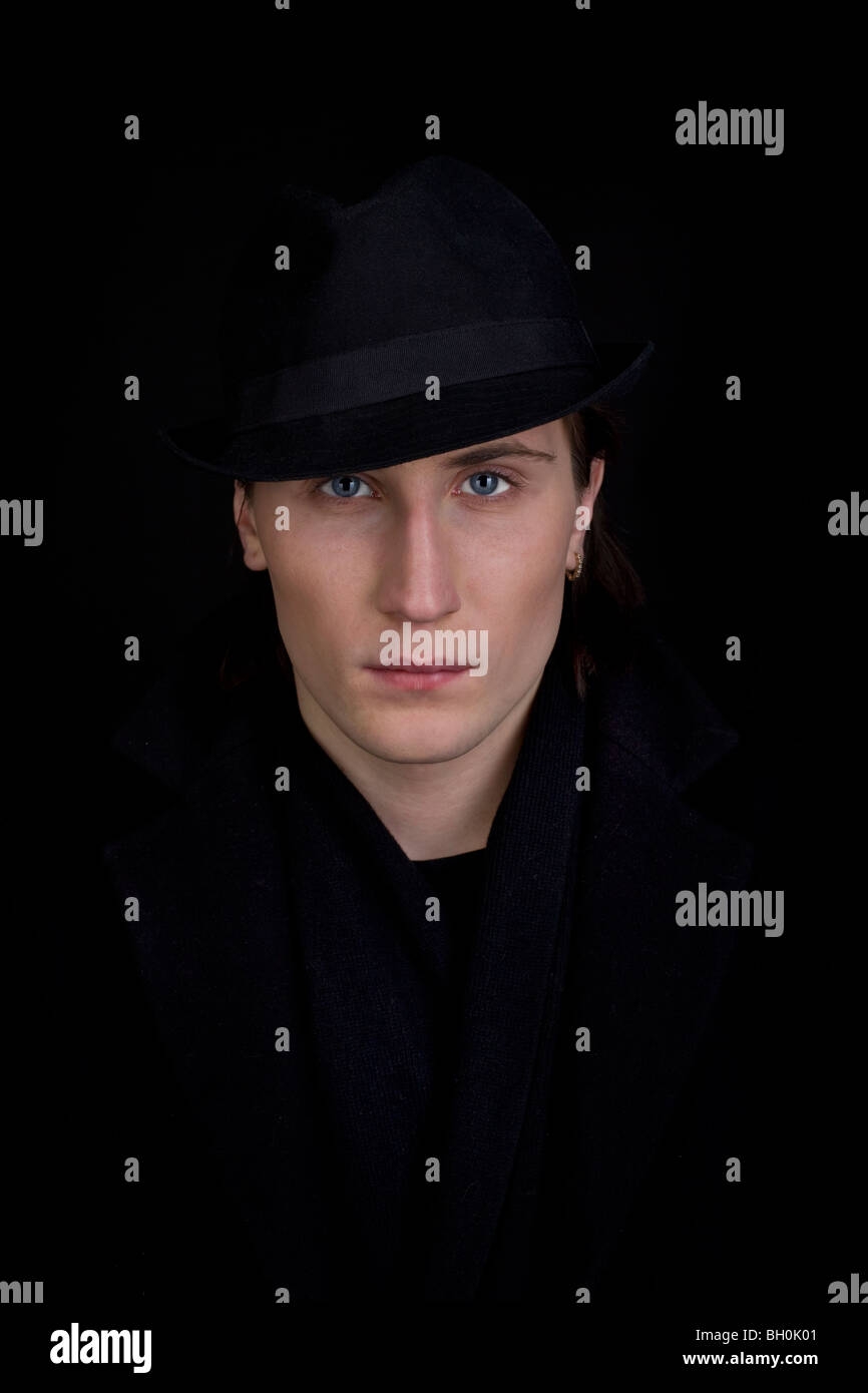 Man in black hat look at you portrait Stock Photo - Alamy
