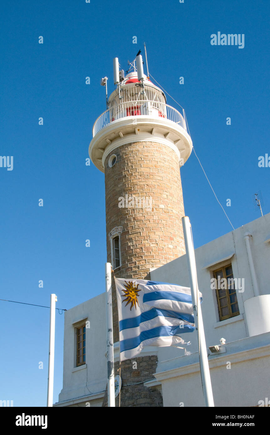 Uruguay. Lighthouse in Punta Brava, Montevideo, with Uruguayan flag in ...