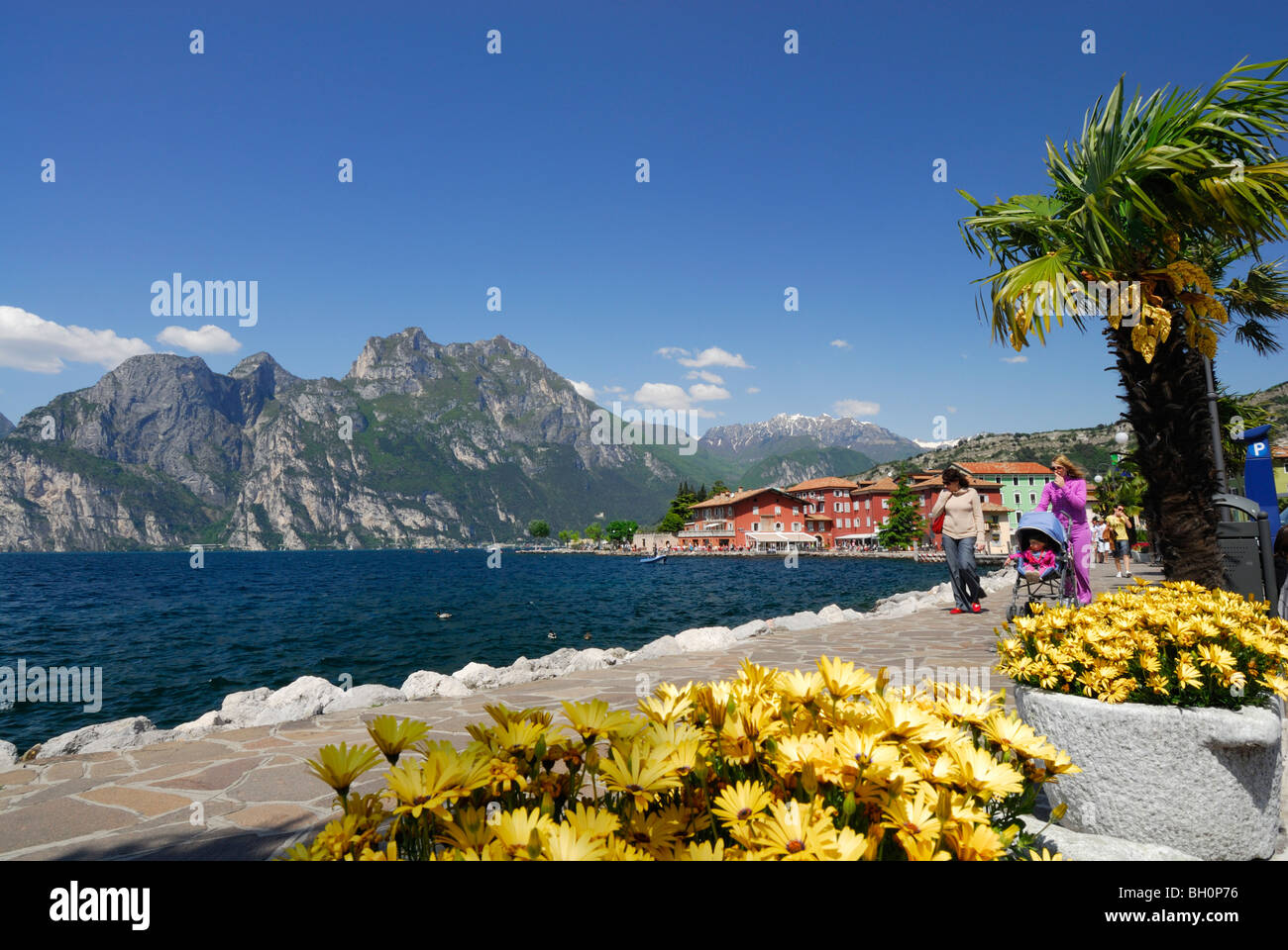 Lakeside promenade at lake Garda, Nago-Torbole, Trentino-Alto Adige ...