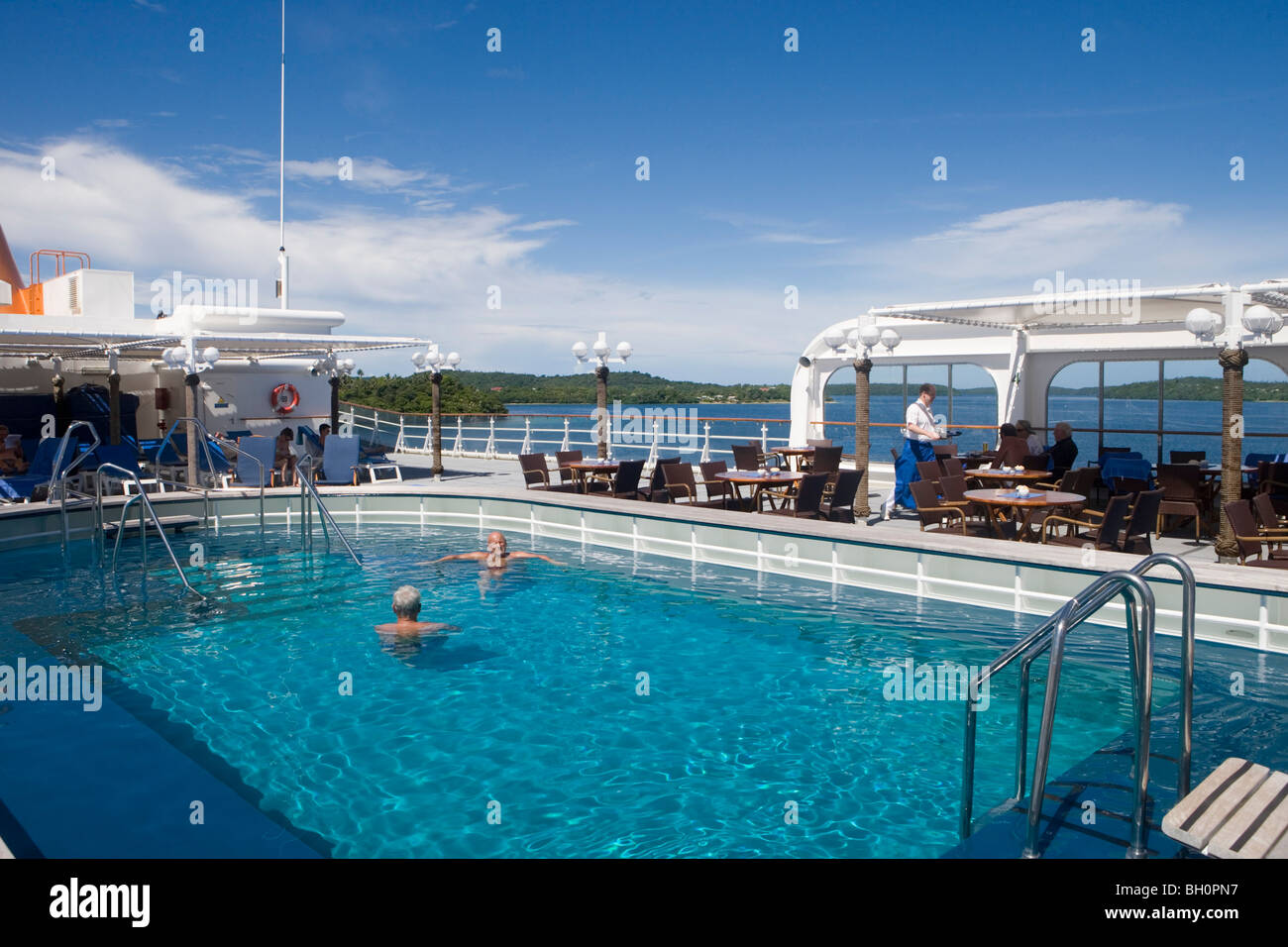 People at the swimming pool aboard Cruiseship MV Columbus, Vava'u Group ...