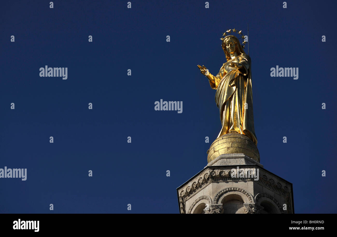 golden angel on the palace of the pope in avignon, provence, southern ...