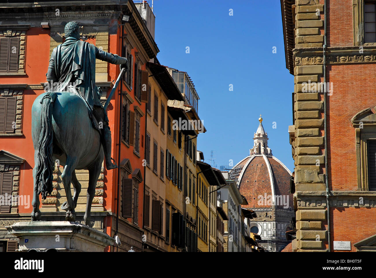 Equestrian statue of Ferdinand I. under blue sky, Piazza S S Annunziata ...