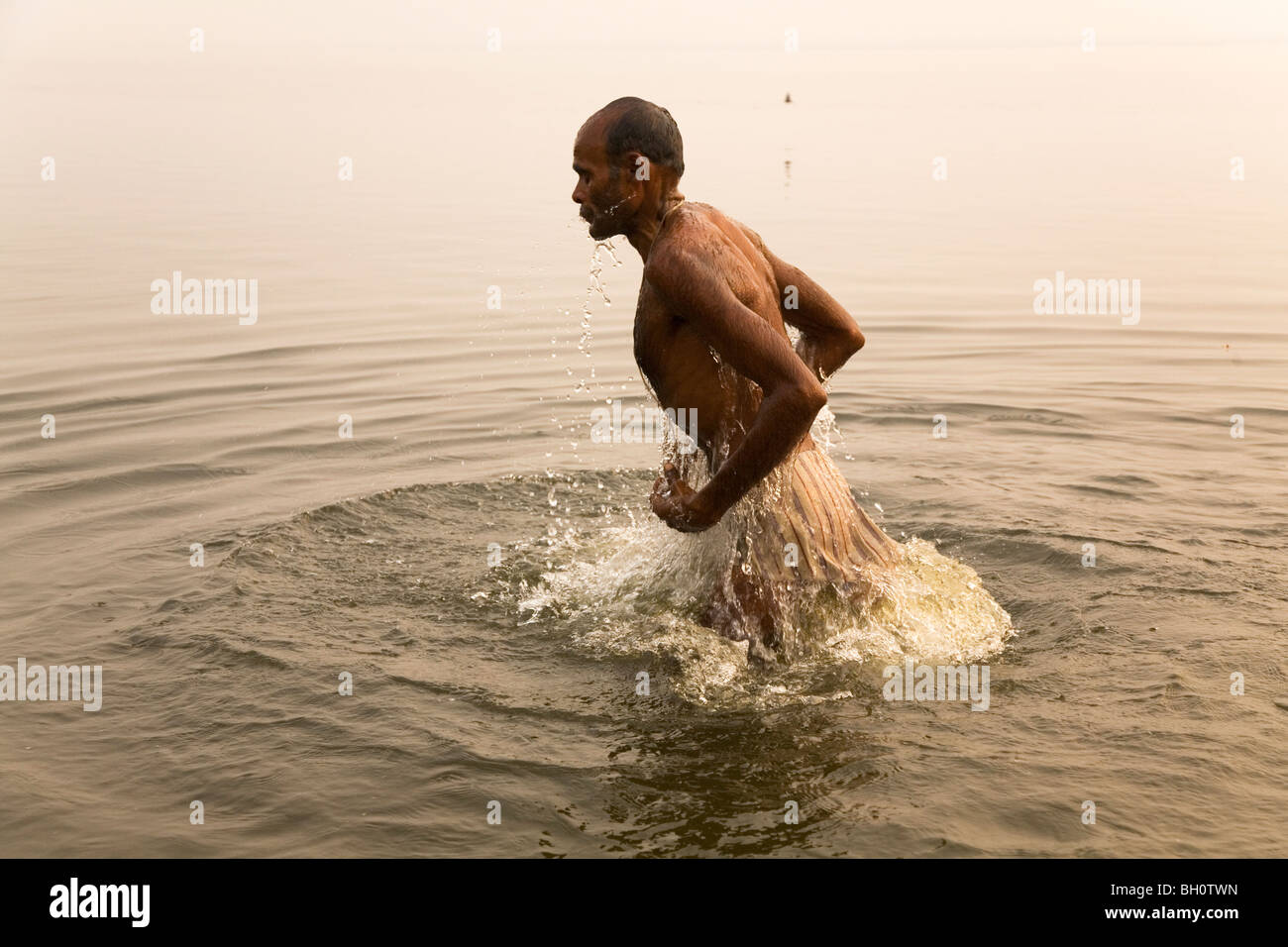 Ritual washing in ganges river hi-res stock photography and images - Alamy