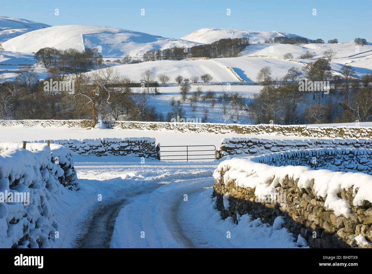 Snowy road and landscape near Bolton Abbey, Wharfedale, Yorkshire Dales ...