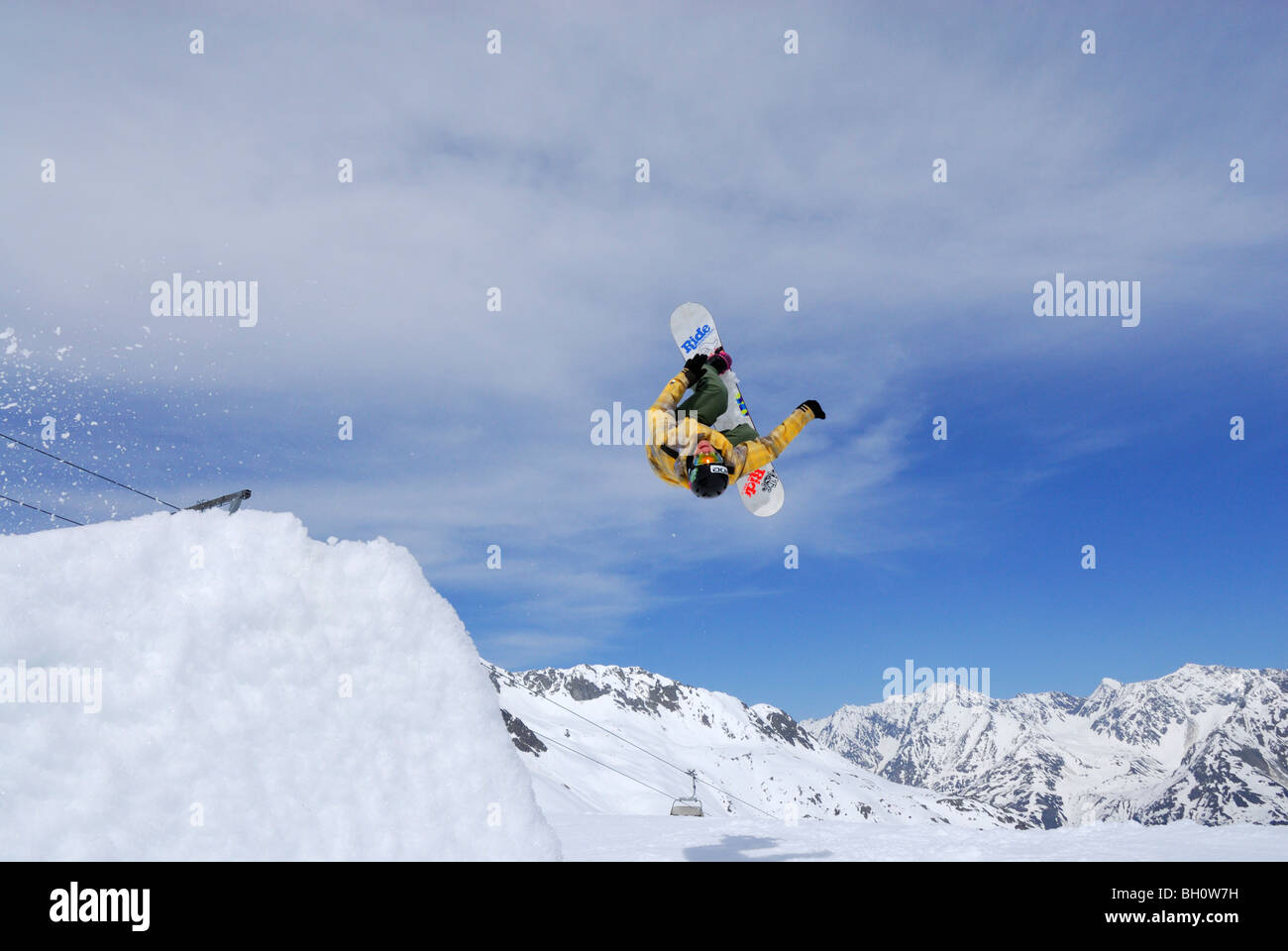 Snowboarder in mid-air, back-flip, ski area Soelden, Oetztal, Tyrol ...