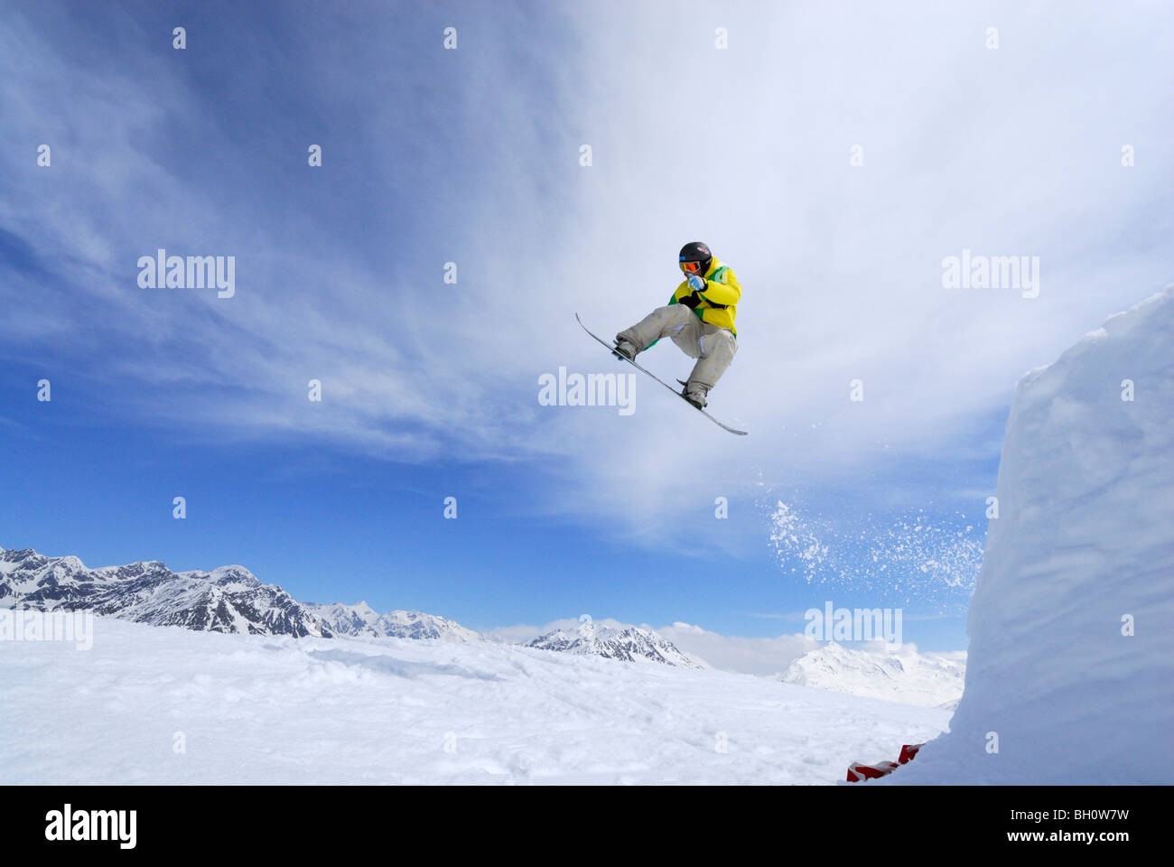Snowboarder jumping from a kicker, ski area Soelden, Oetztal, Tyrol ...
