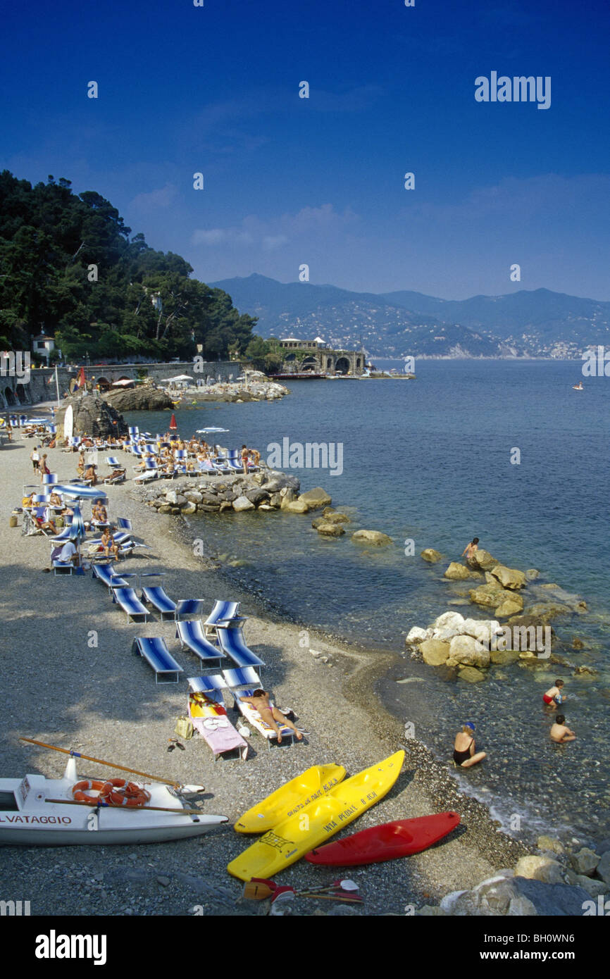 People on the beach under blue sky, Liguria, Italian Riviera, Italy ...