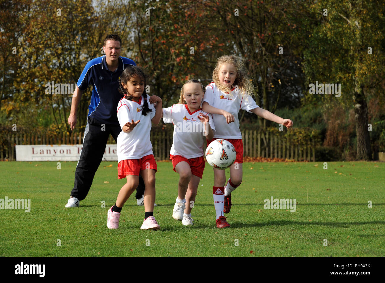 Girls football coaching Stock Photo - Alamy
