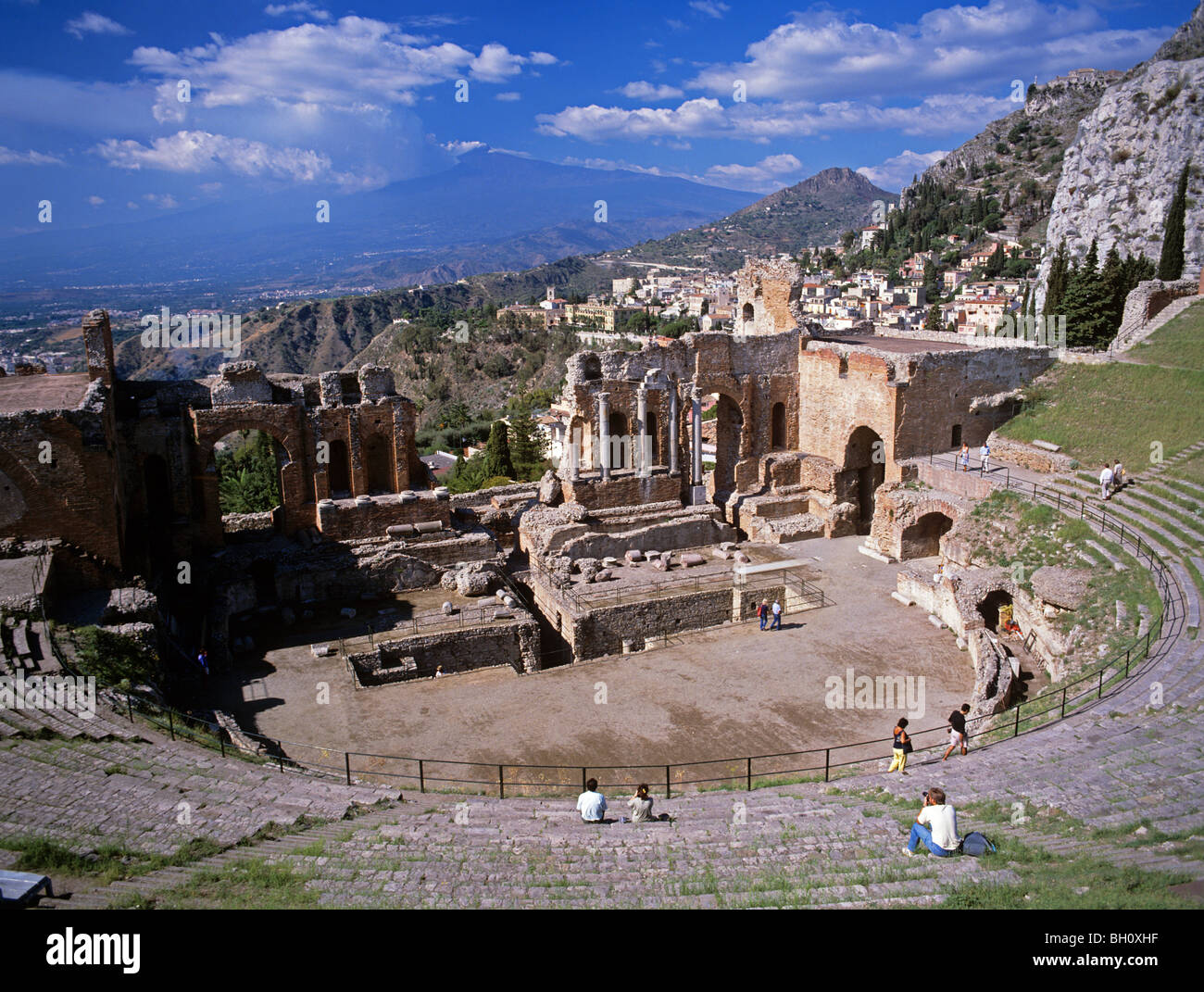 View of the Greco-Roman Theatre at Taormina with Mount Etna in the ...