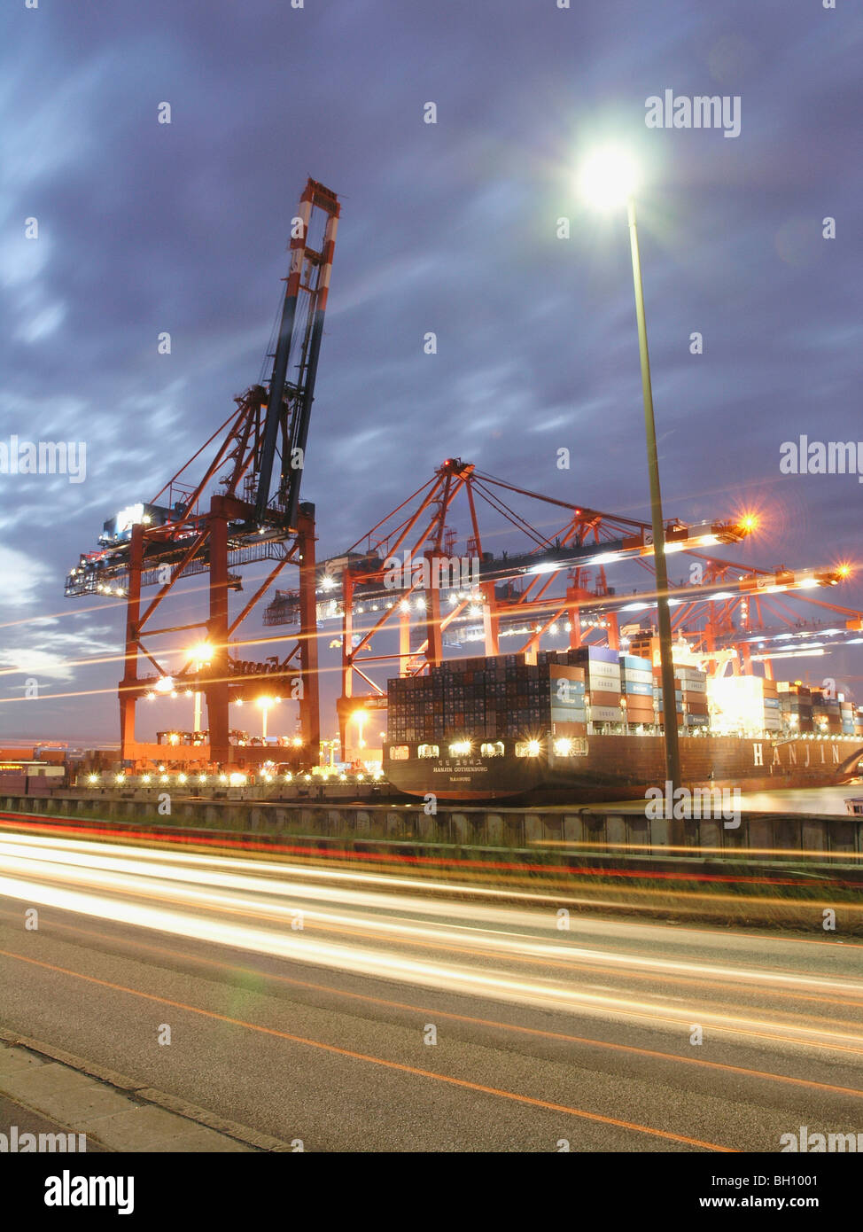 Container cranes at container port in the night, Hamburg, Germany Stock ...