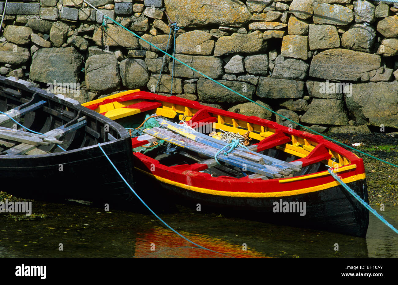 Europe, Great Britain, Ireland, Co. Galway, Connemara, rowing boats at ...
