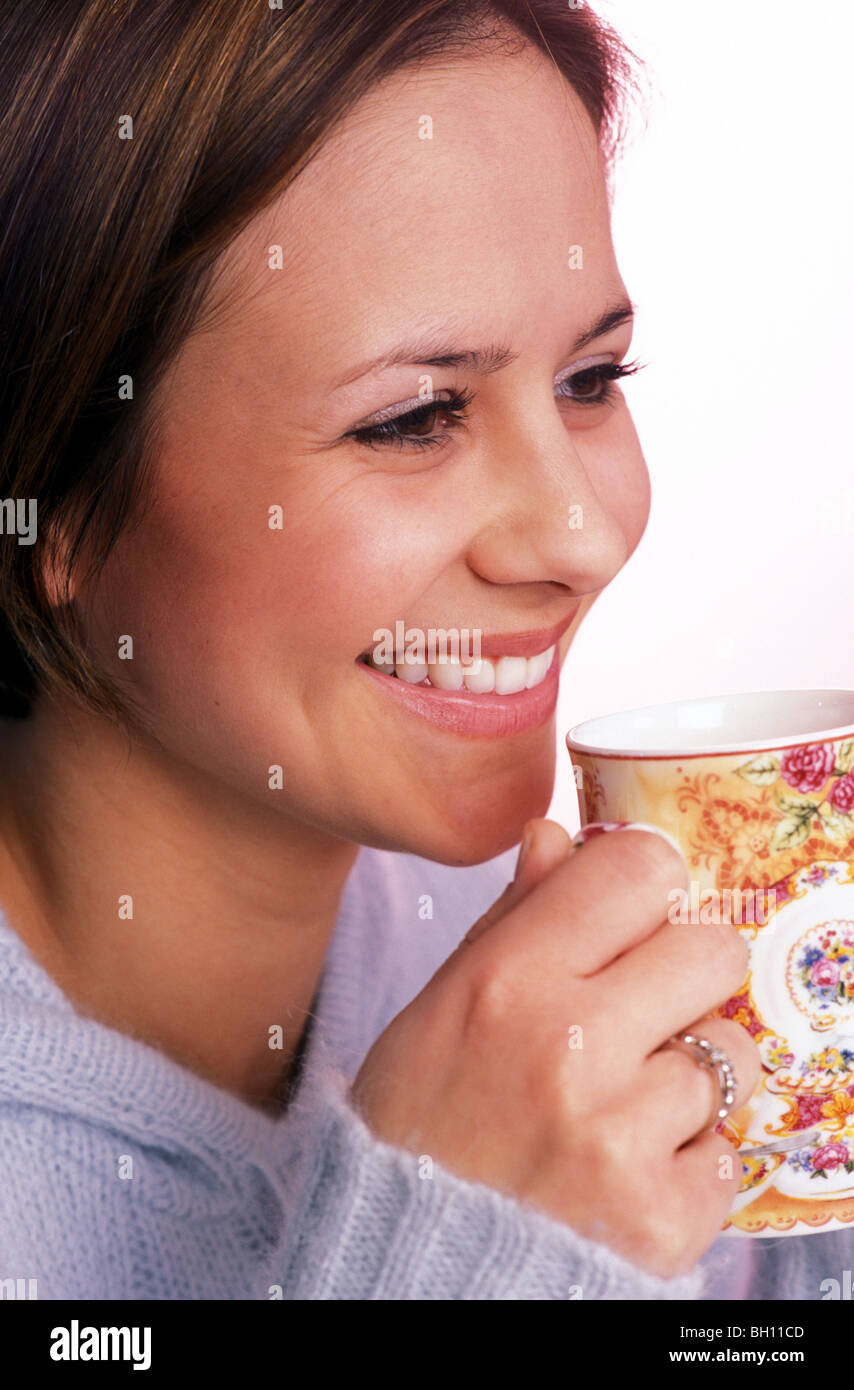Young Woman with Porcelain Mug Stock Photo - Alamy