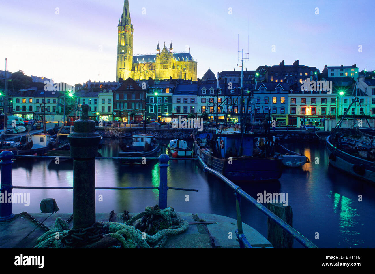 Old Town with illuminated St. Colman cathedral and harbour in the ...