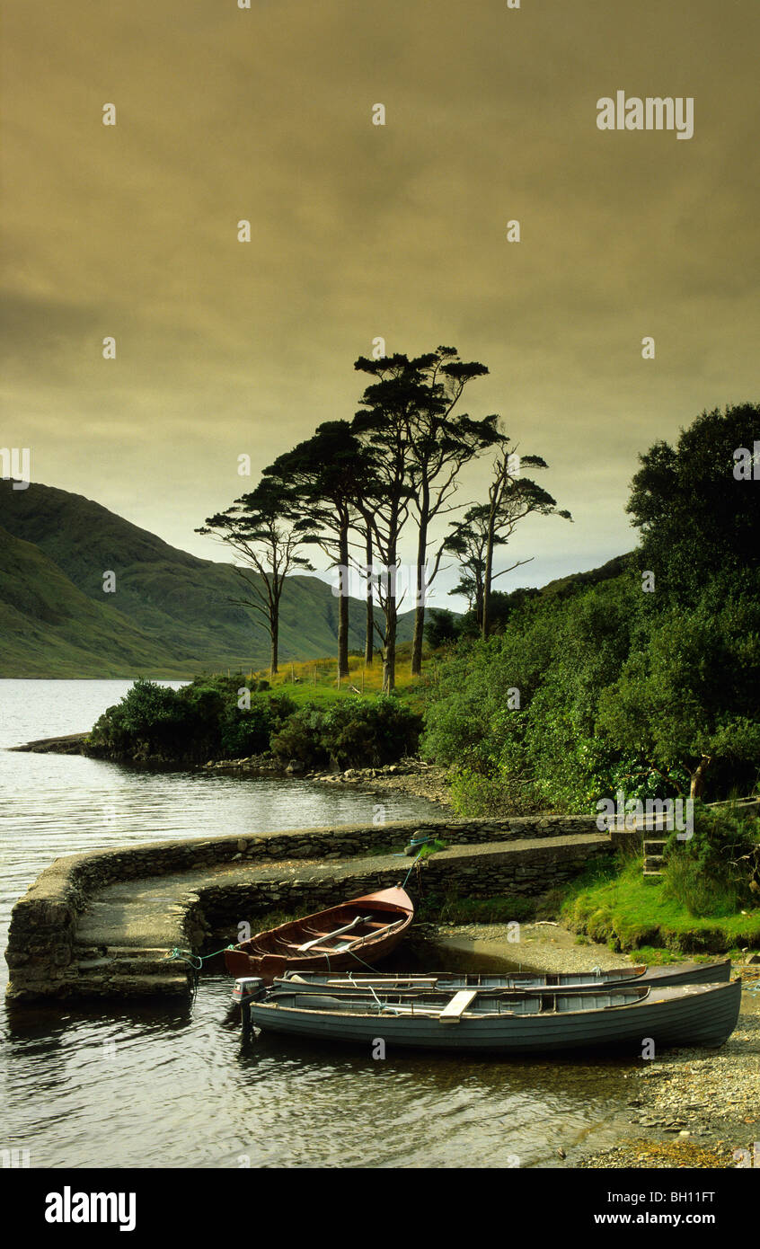 Boats at a jetty at Doo Lough, Connemara, County Mayo, Ireland, Europe ...