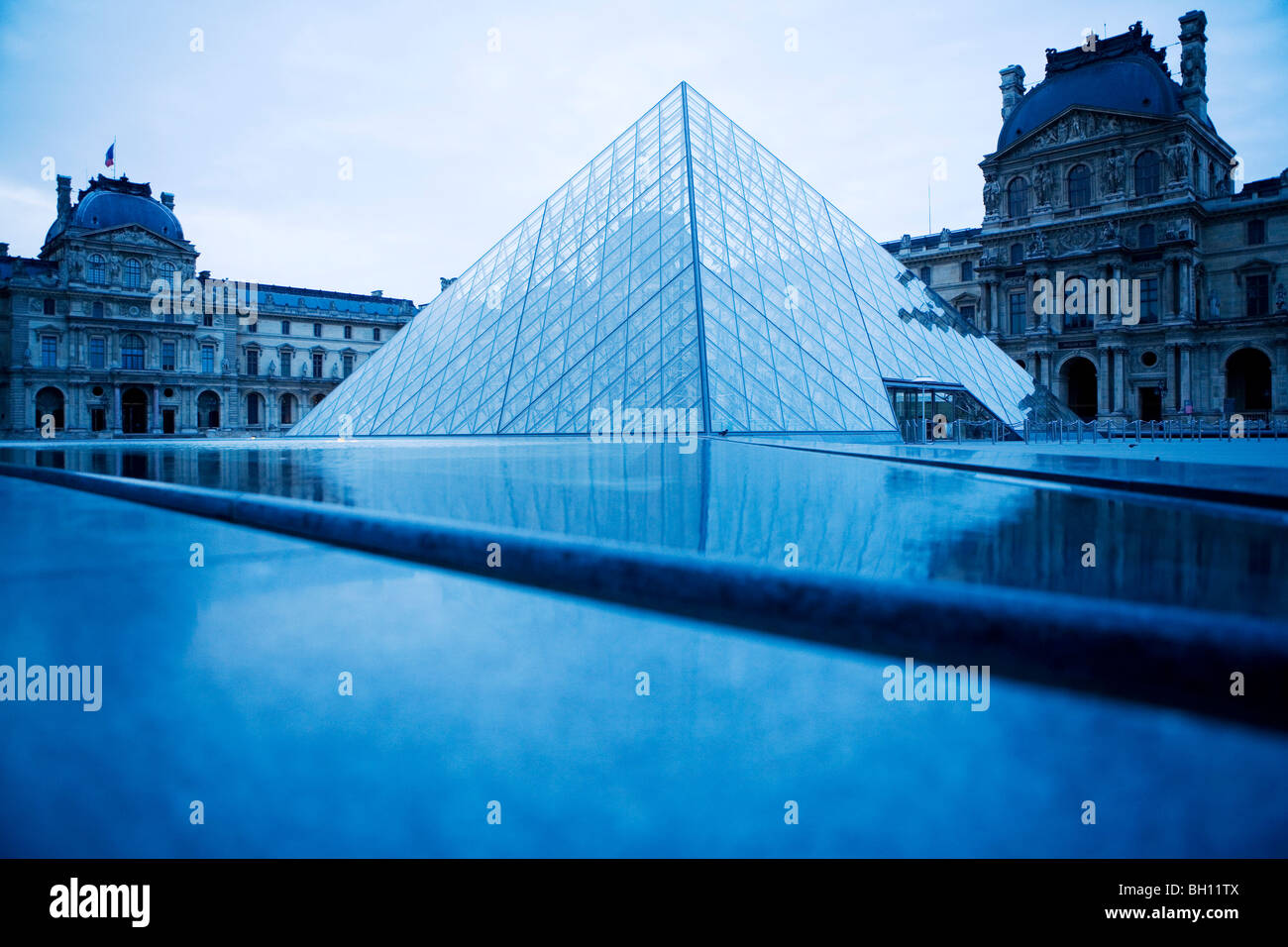 The Louvre museum with the Louvre Pyramid, Paris, France Stock Photo ...