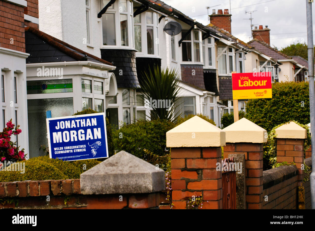 Conservative and Labour Party posters on front gardens of houses in the ...