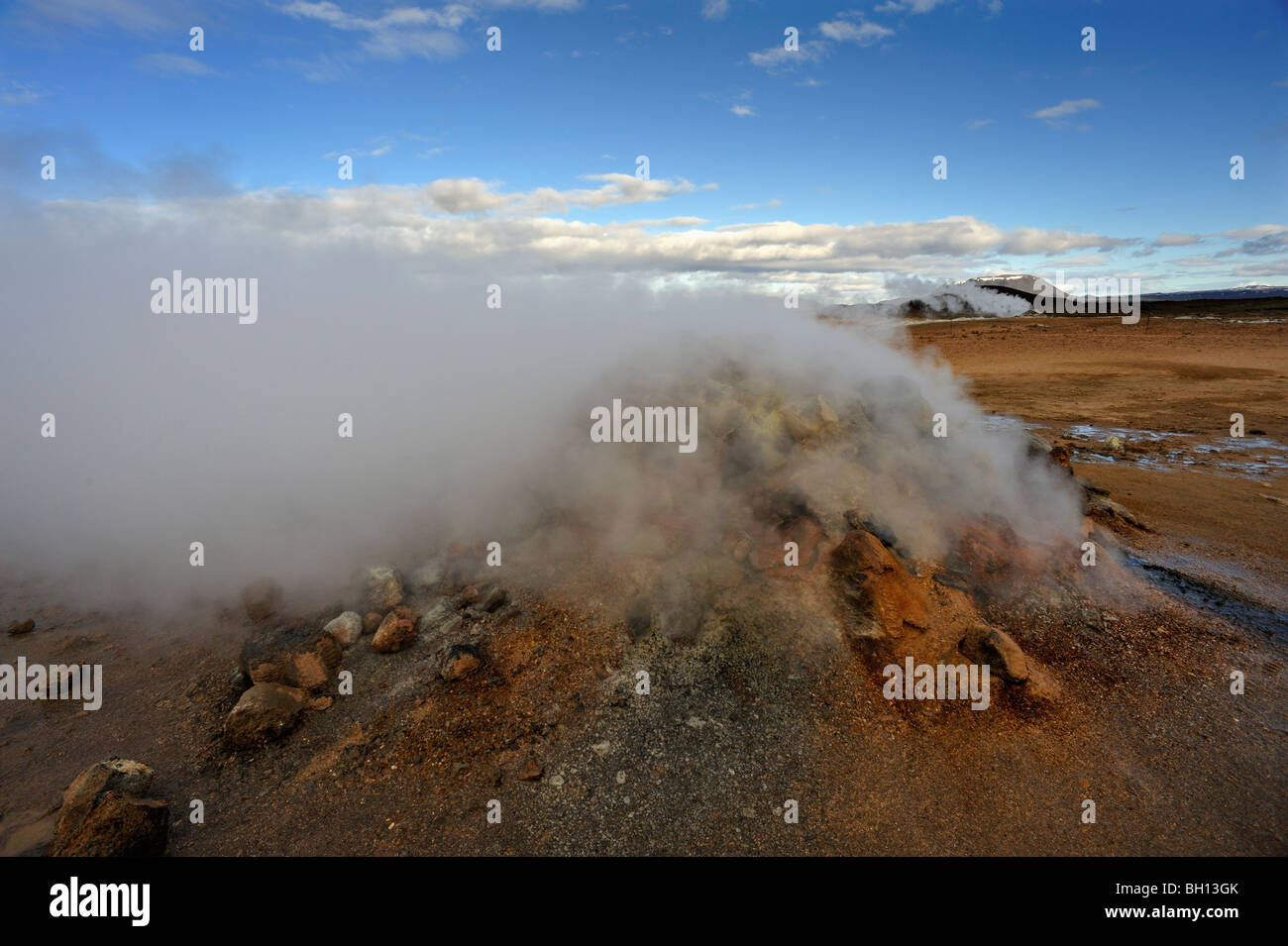 Steaming vents or fumaroles in a geothermal landscape at Hverarond near ...