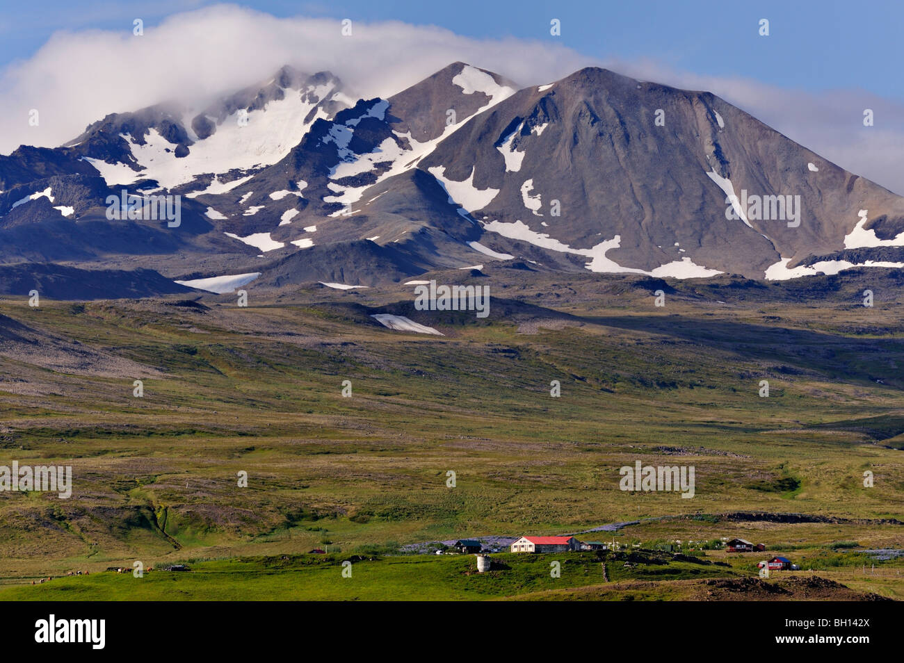 Lonely farmstead below the distant Hnappadale hills on the Snaefellsnes ...