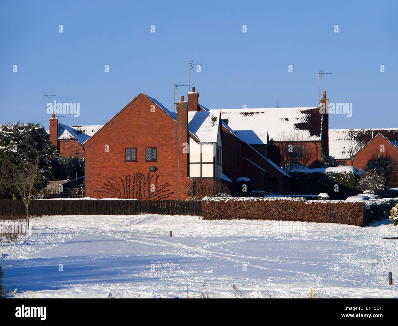 A snow covered rural landscape in a village Stock Photo - Alamy