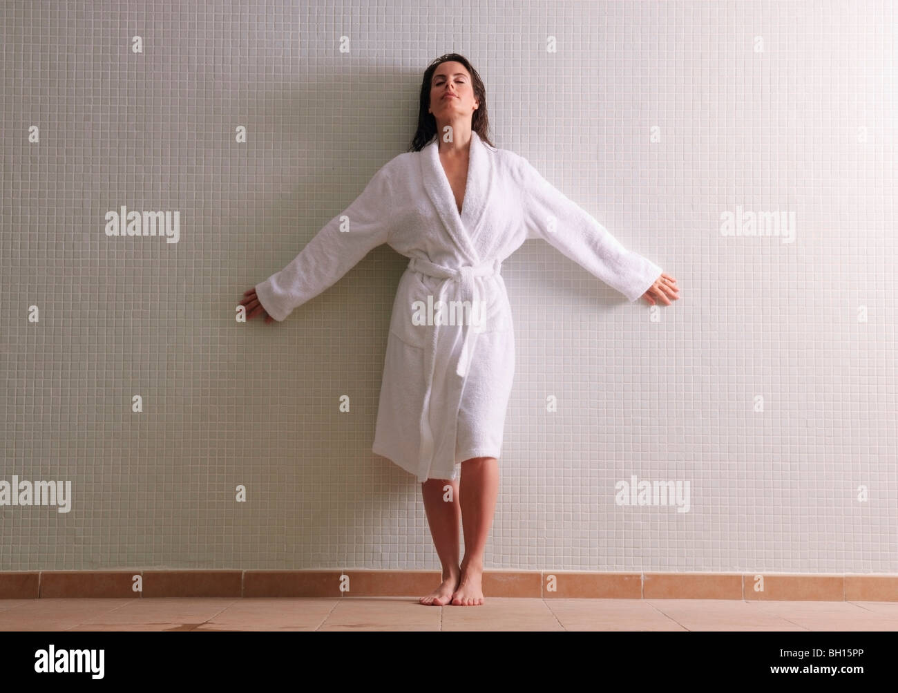 Woman in spa robe Stock Photo - Alamy