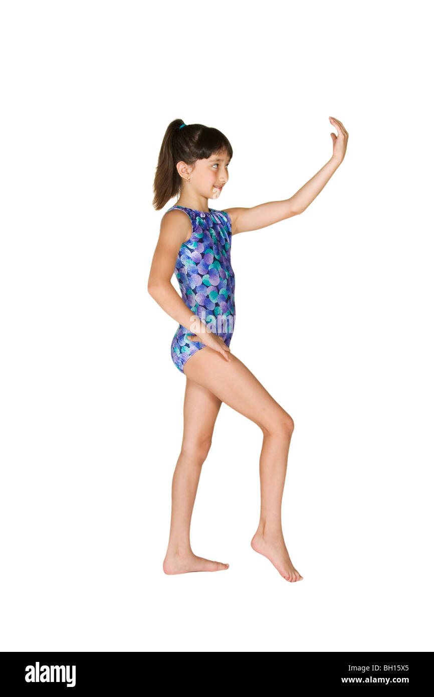 Caucasian girl in gymnastics poses Stock Photo - Alamy