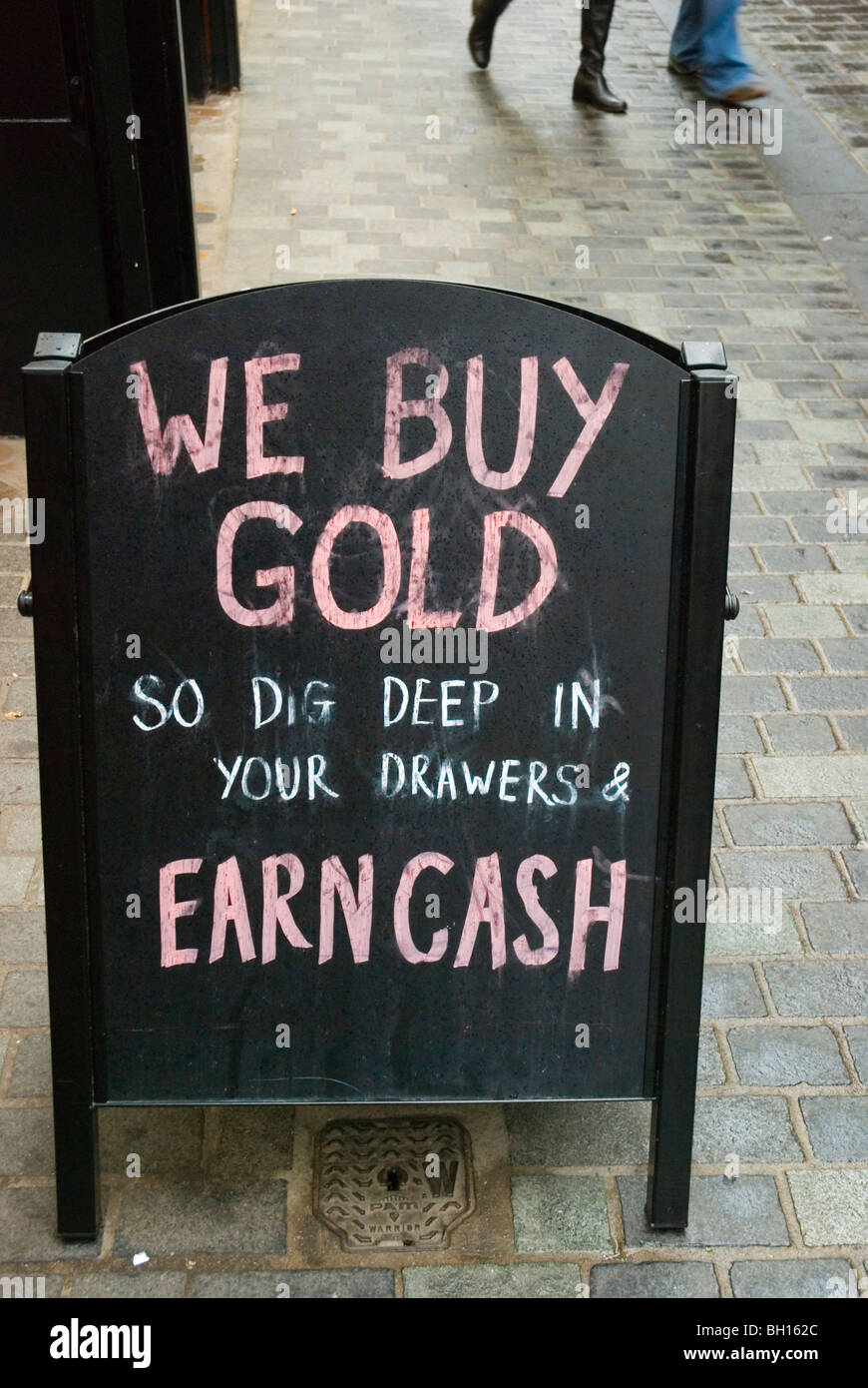 Sign of a jewellery store into buying gold central Liverpool England UK ...