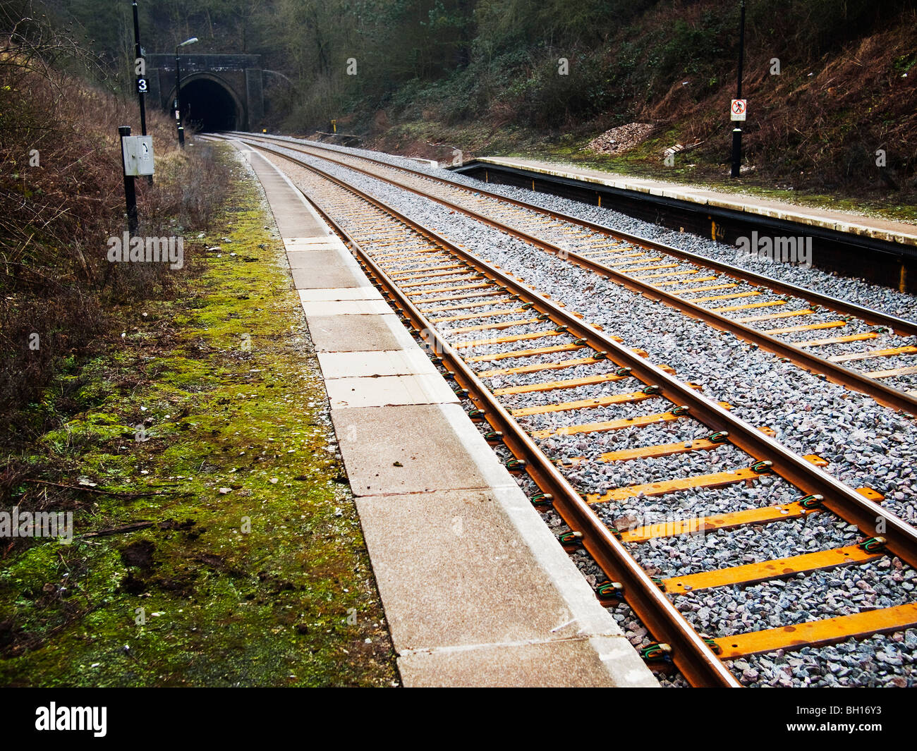 A station on a railway line in the countryside Stock Photo - Alamy