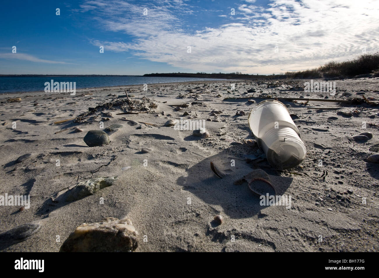 Litter on a beach Stock Photo - Alamy