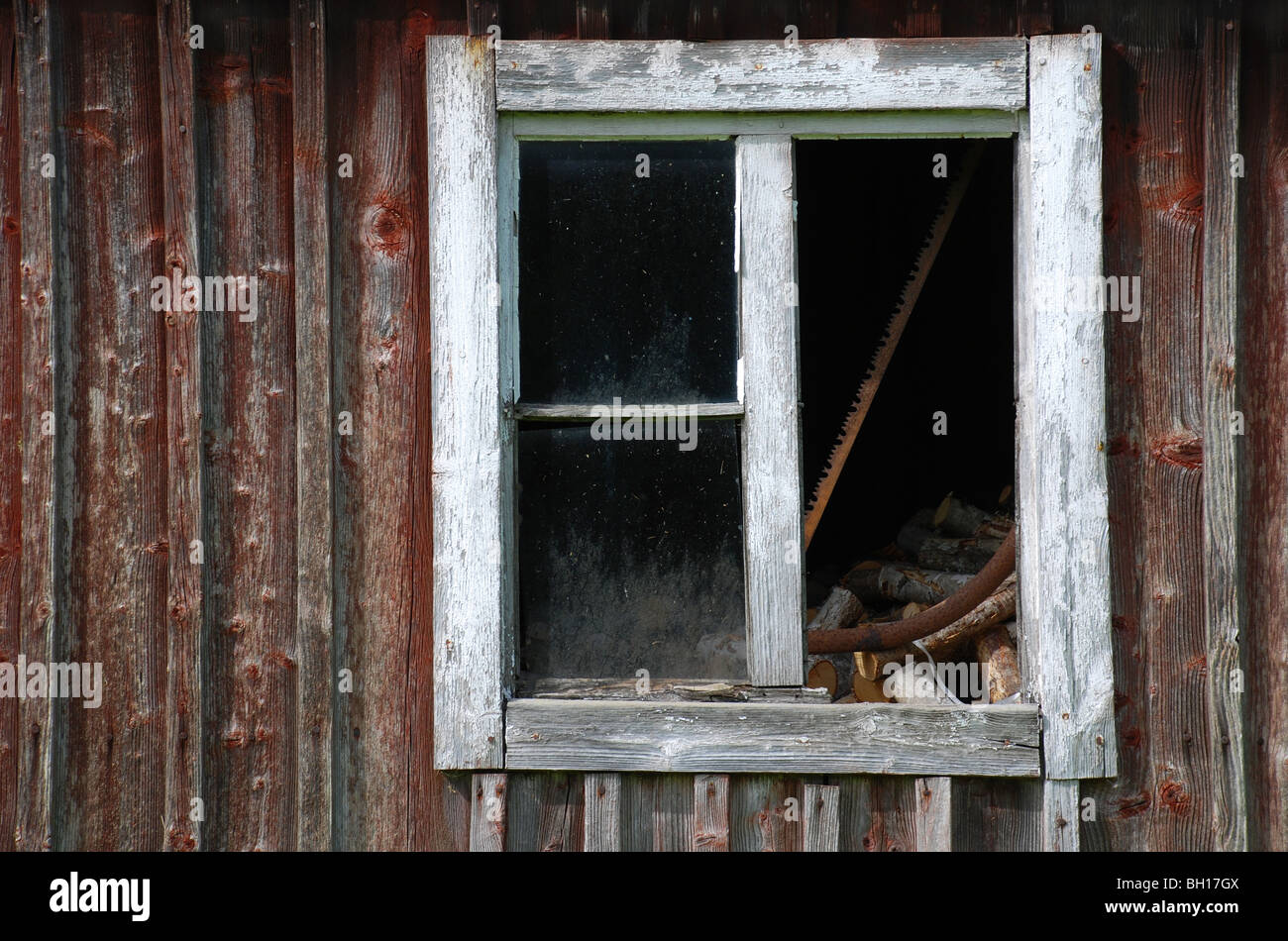 Saw in window Stock Photo - Alamy