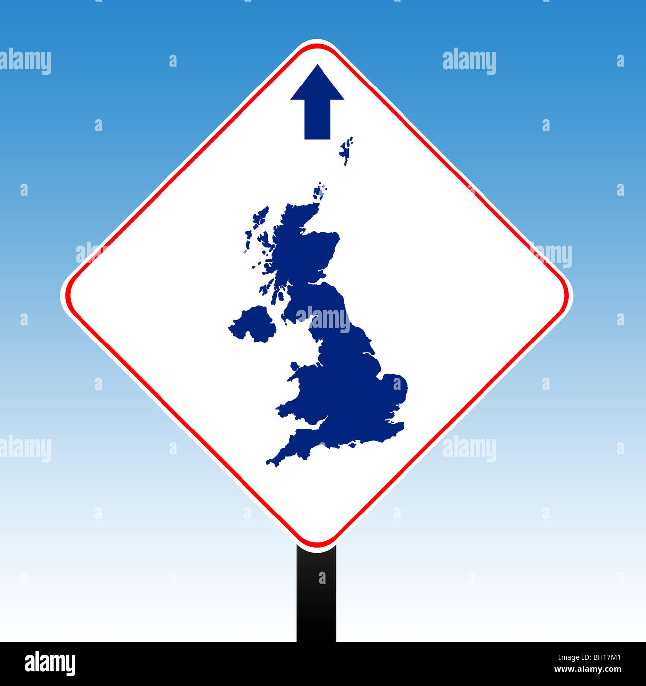 United Kingdom road sign with directional arrow, blue sky background ...