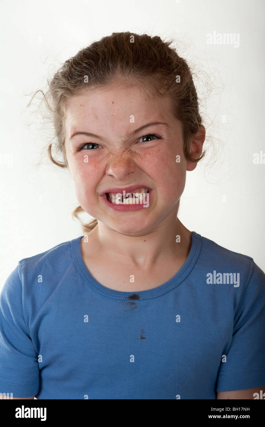 little girl grinning big to show her two missing front teeth Stock ...