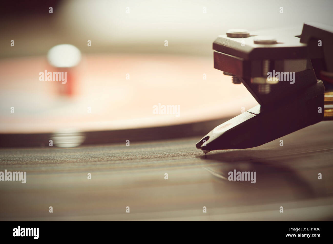 Stylus in groove of vinyl LP Stock Photo - Alamy