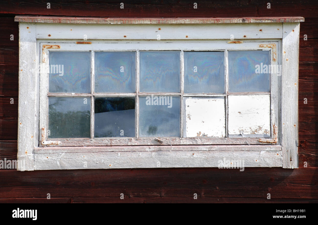 broken glass on a barn window Stock Photo - Alamy