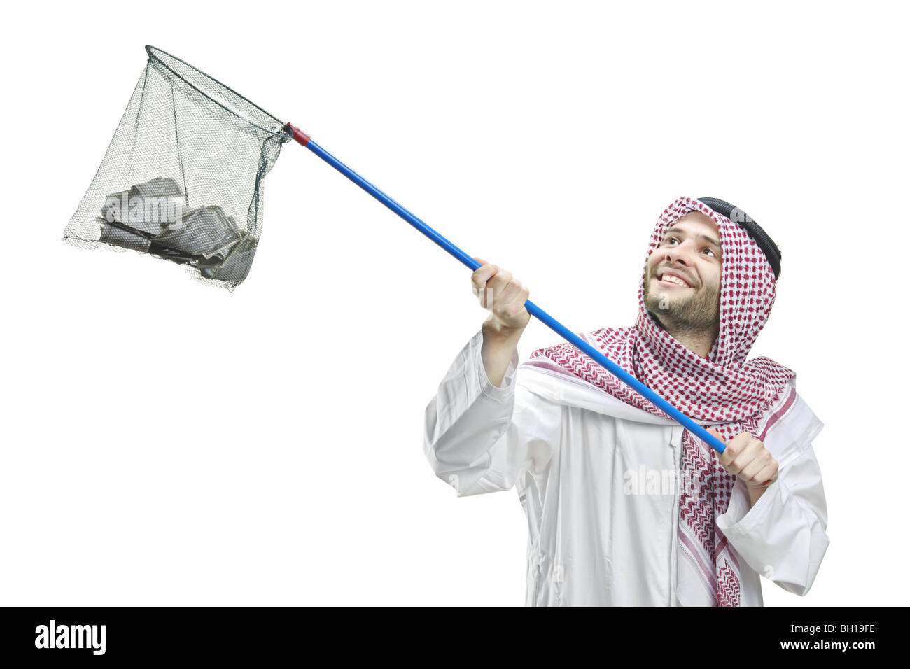 Arab person holding a net with US dollars in it, isolated on white ...