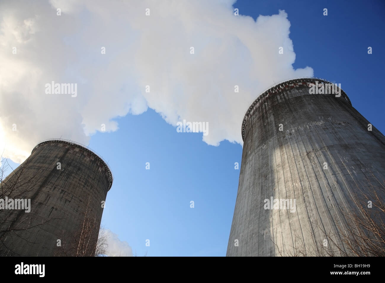 Big chimneys, steam on a blue sky background. Supply in winter Stock ...