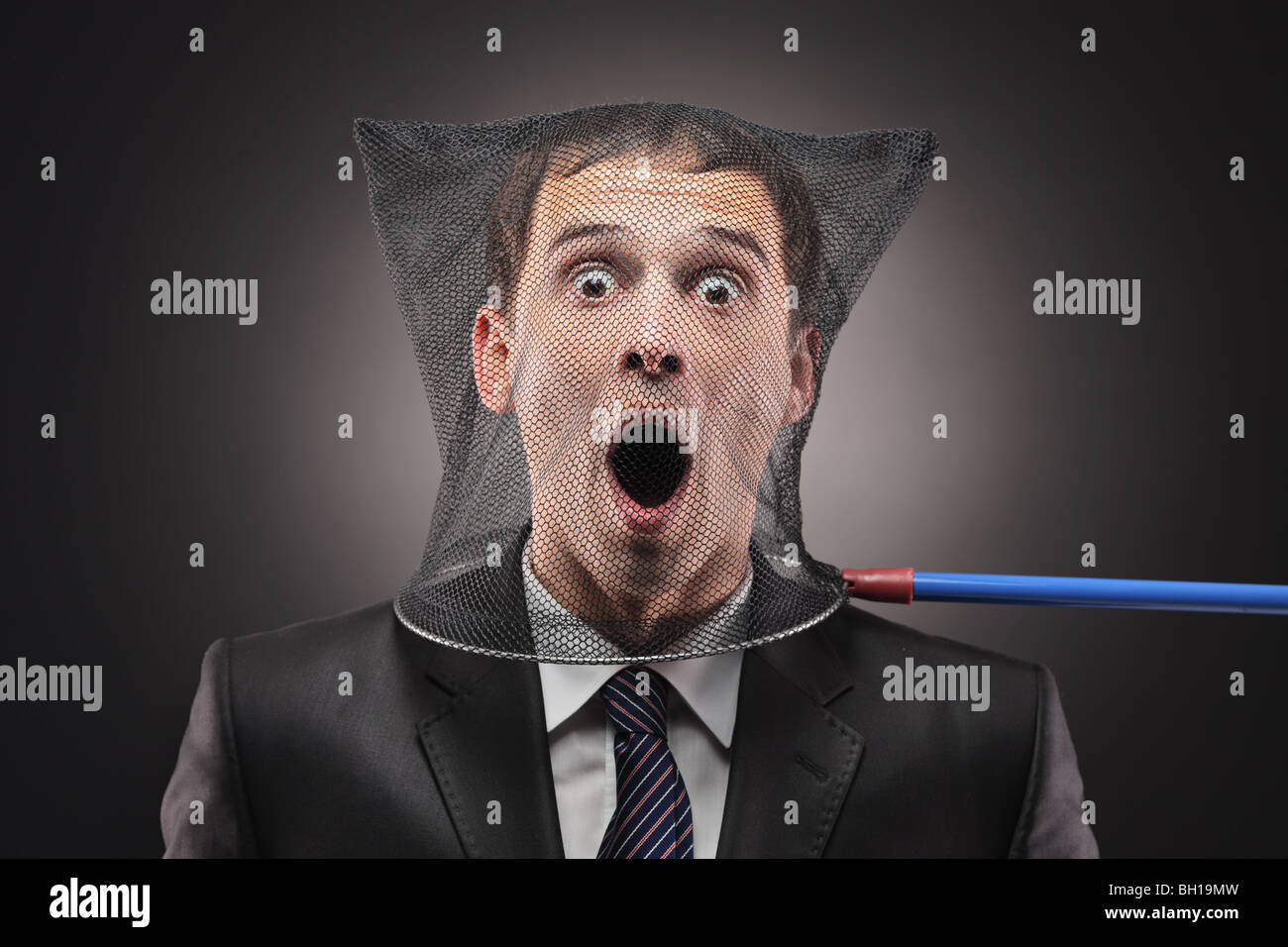 Net man caught trap hi-res stock photography and images - Alamy