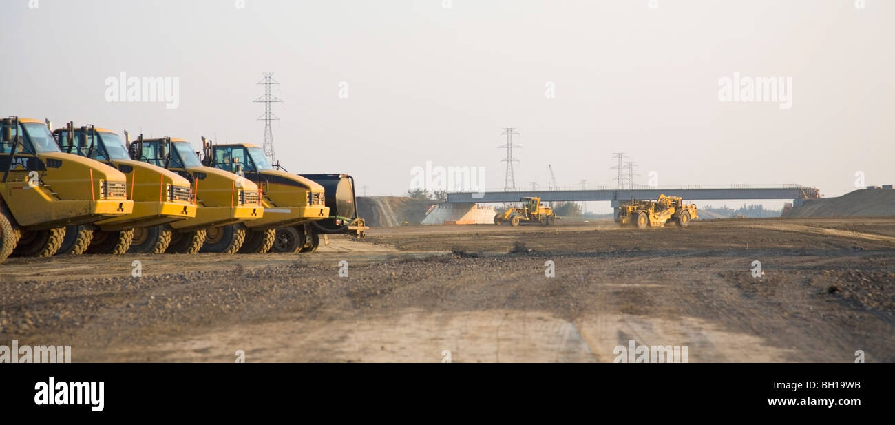 Tractors on construction site Stock Photo - Alamy