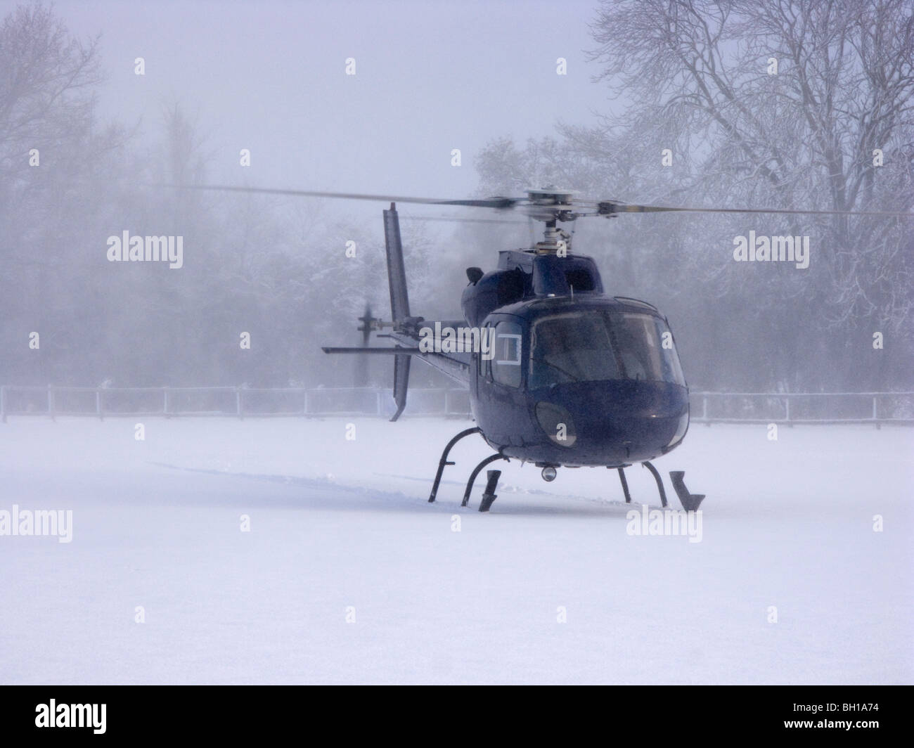 helicopter in the snow Stock Photo - Alamy