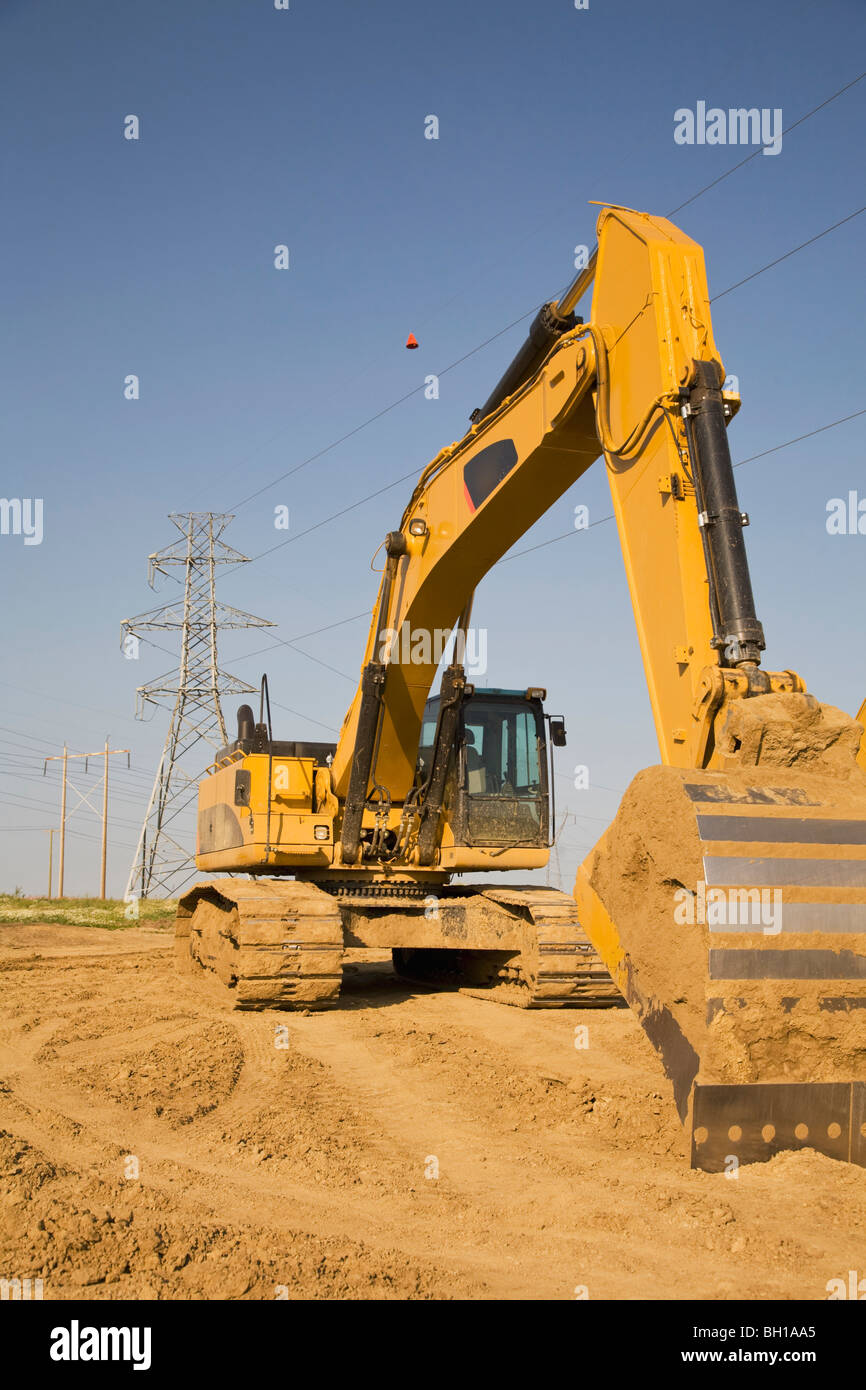 Excavator on construction site Stock Photo - Alamy