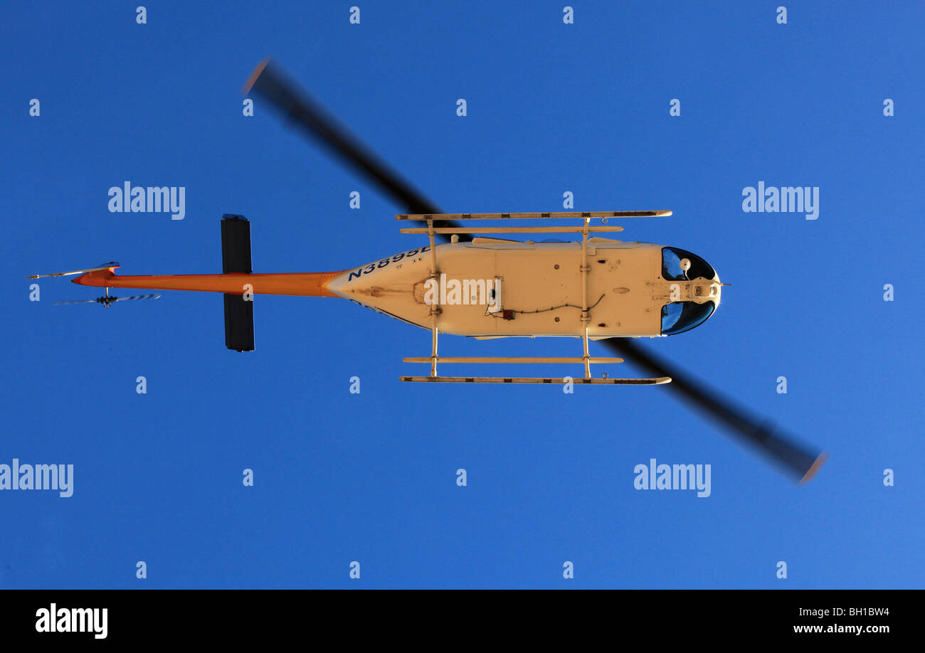 Under view of helicopter flying Stock Photo - Alamy