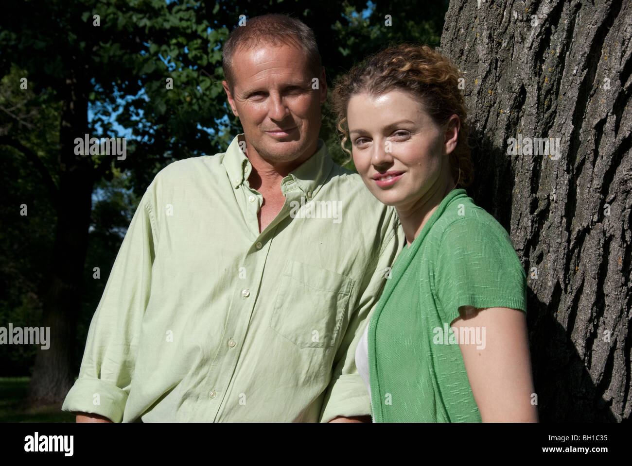 Stand beside the tree hi-res stock photography and images - Alamy