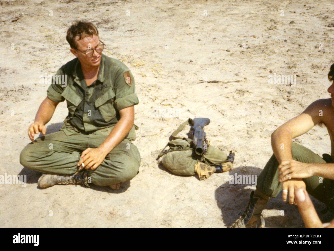 Soldier sitting on the ground with M79 grenade launcher. Elements of ...