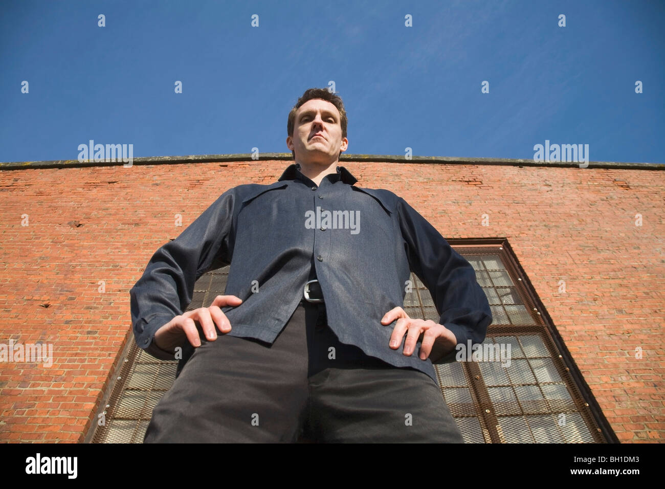 Proud man standing and facing camera hi-res stock photography and ...
