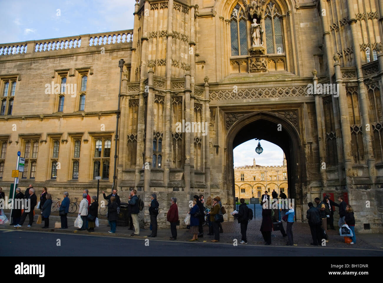 People queueing for bus stop in front of Christ Church in High street ...